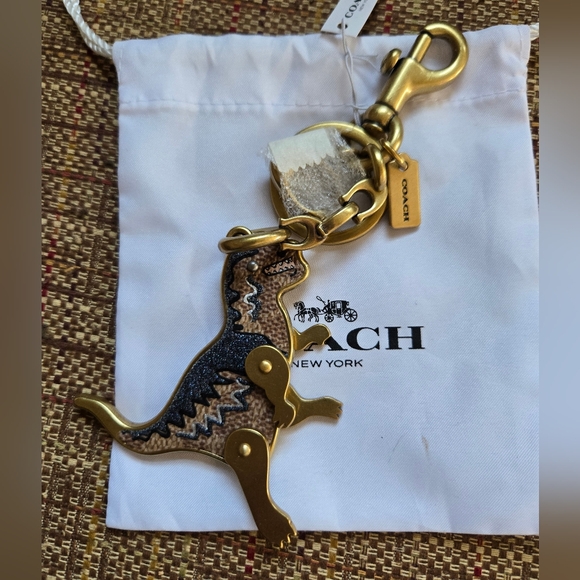 Coach | Bags | Coach Rexy Bag Charm In Signature Canvas | Poshmark